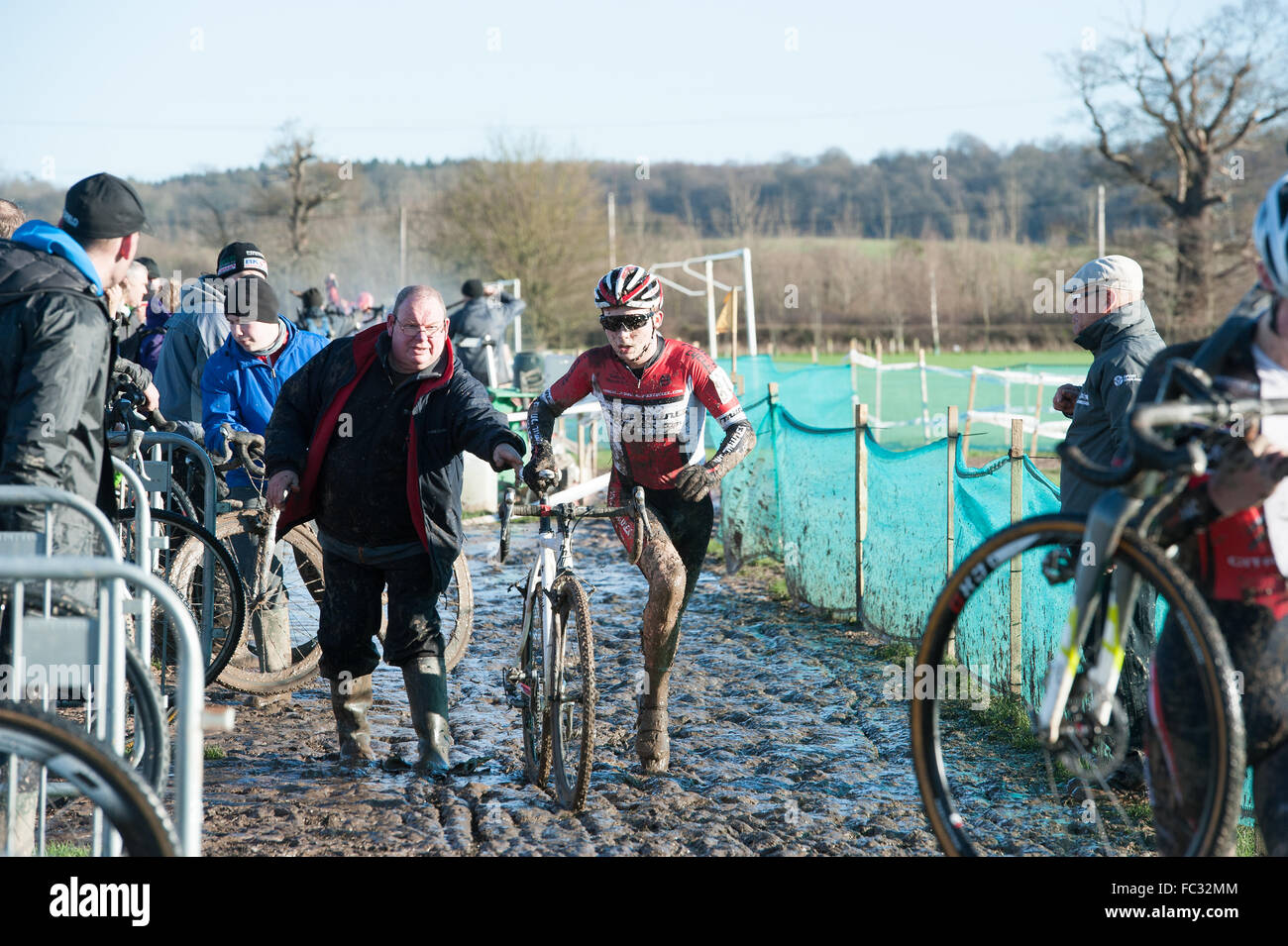 Cyclocros rider running through the pit after changing his bike Stock ...