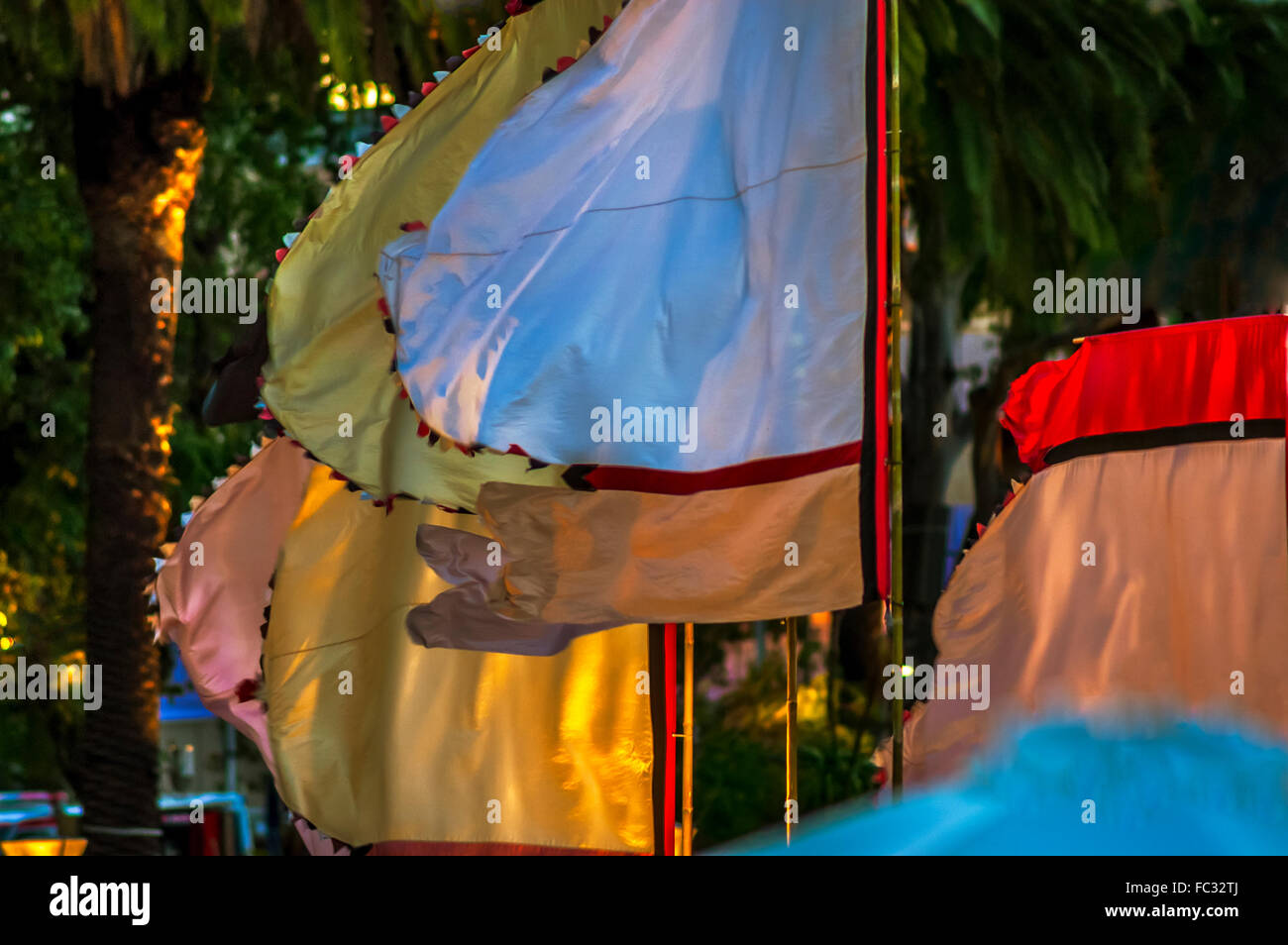 Colourful flags created by artist Angus Watt waving in the wind at ...