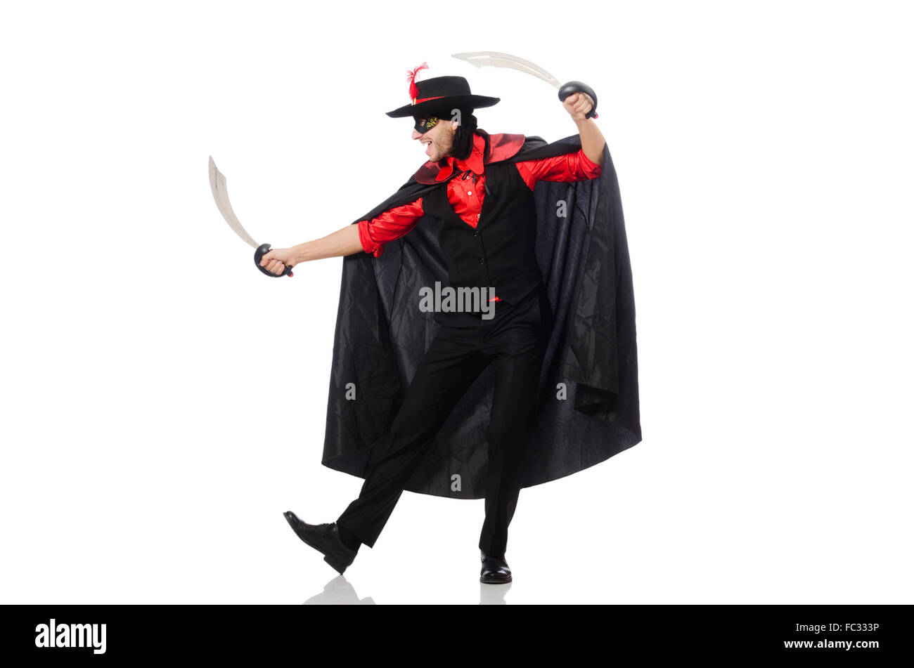 Young man in carnival coat with sword isolated on hi-res stock ...