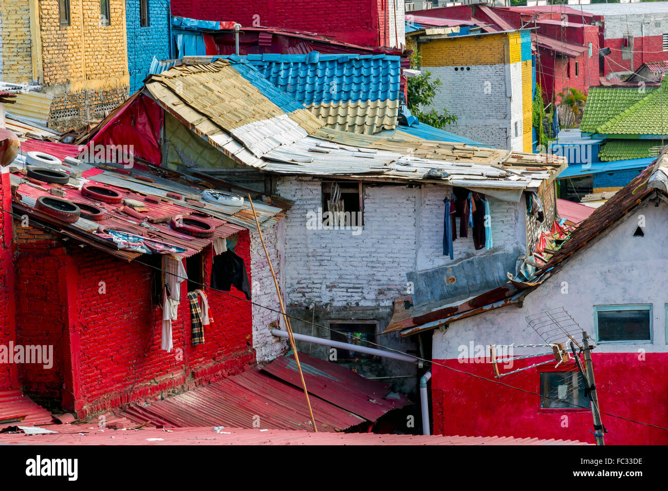 Colorful houses on the banks of Code river in Yogyakarta Stock Photo ...