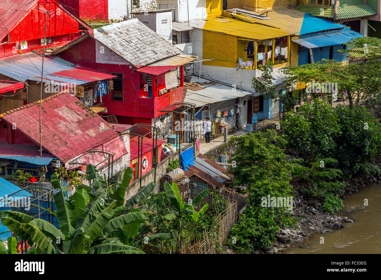 Colorful houses on the banks of Code river in Yogyakarta Stock Photo ...