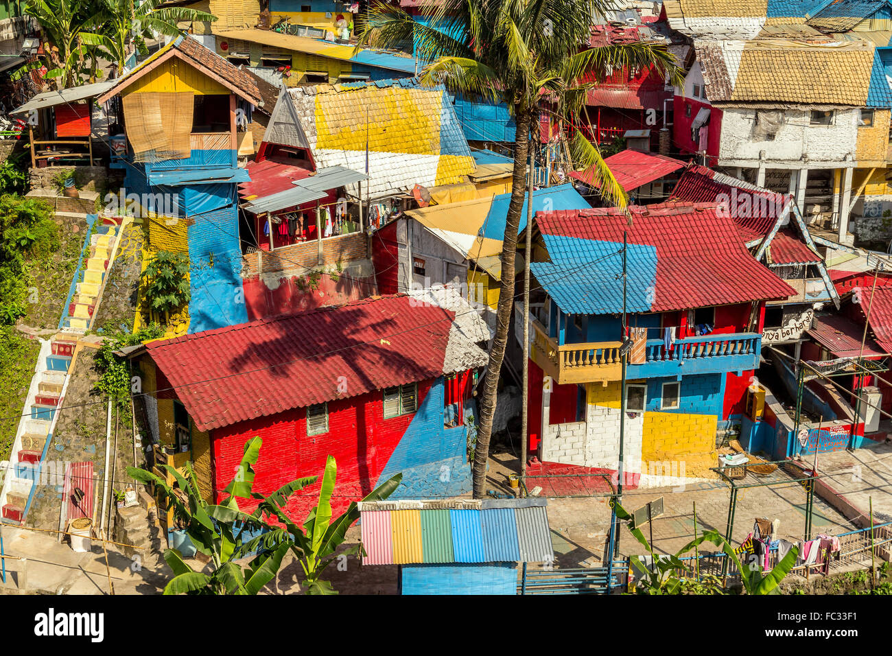 Colorful houses on the banks of Code river in Yogyakarta Stock Photo ...