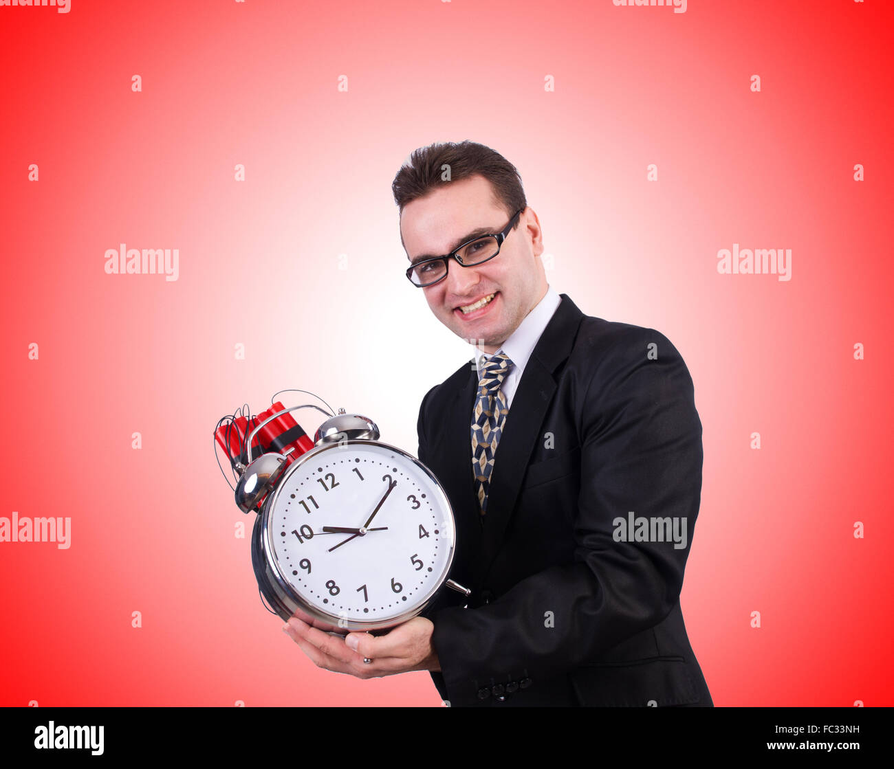 Man with time bomb isolated on white Stock Photo - Alamy