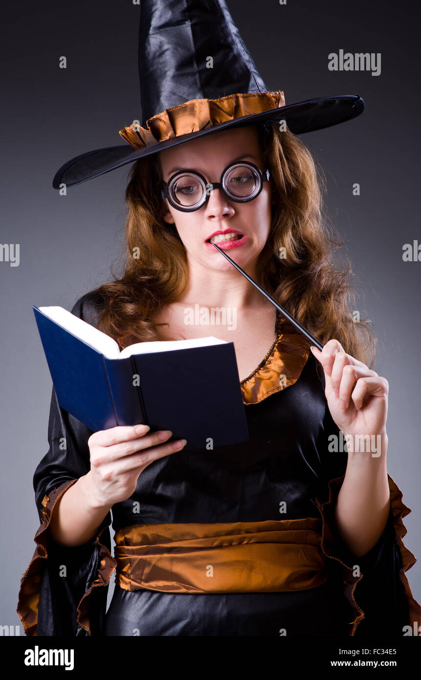 Witch doing her dirty tricks Stock Photo - Alamy