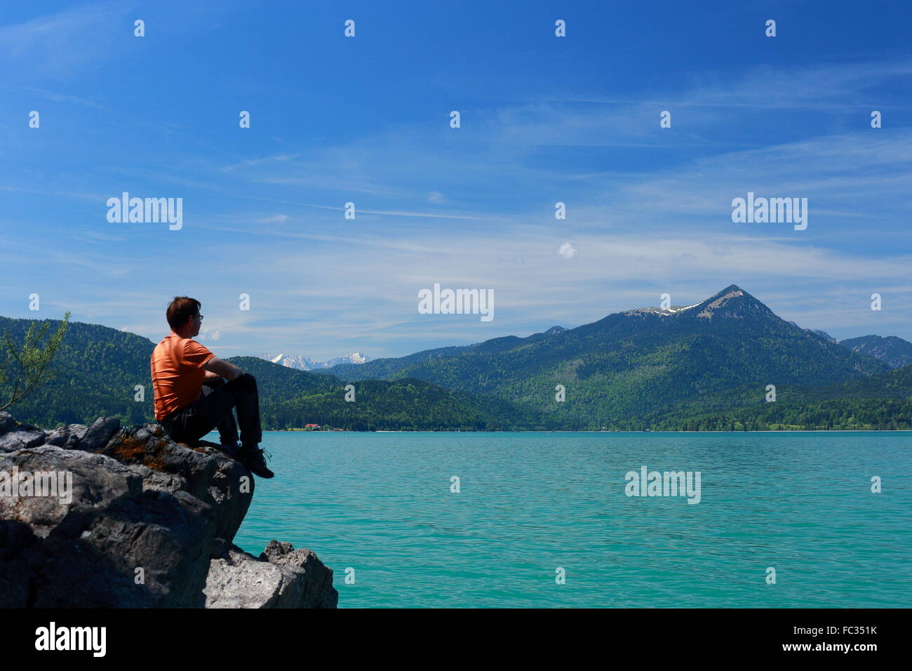 man on rock Stock Photo - Alamy