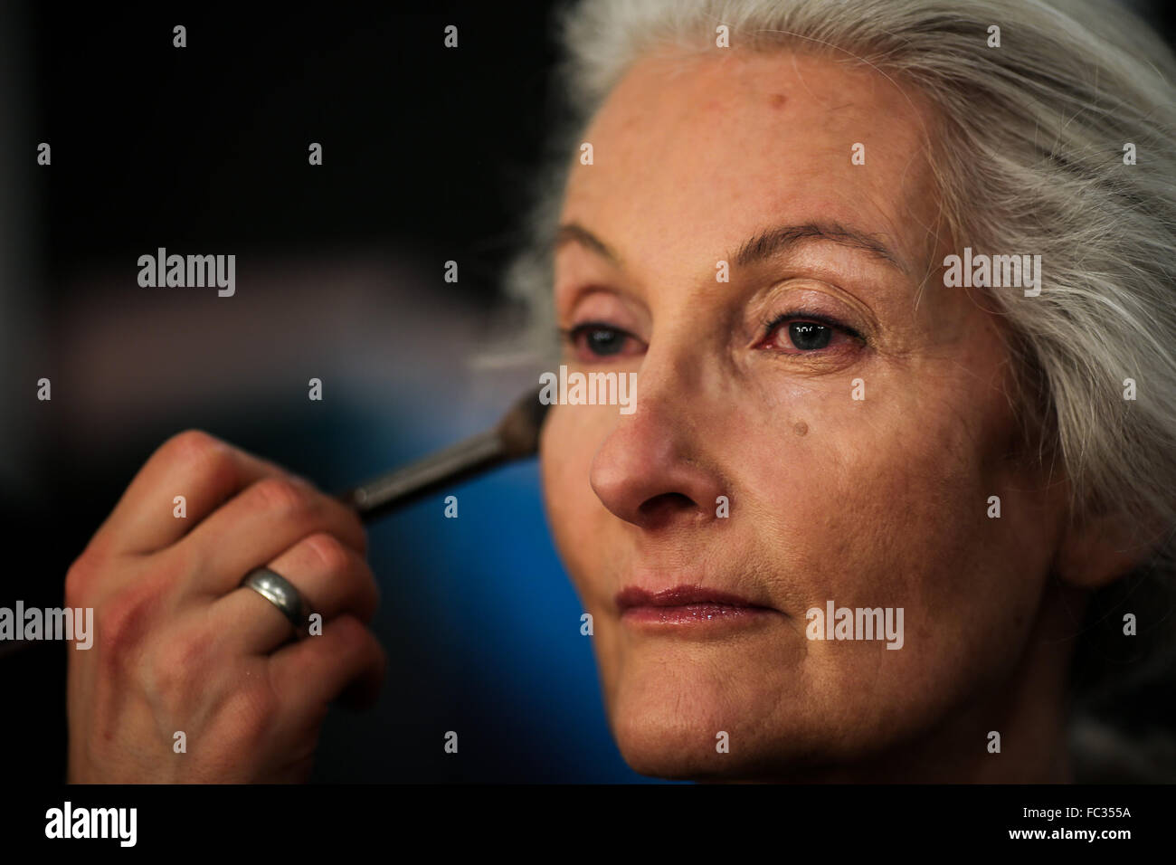 Berlin, Germany. 20th Jan, 2016. Model Catherine Loewe, 61, prepares ...