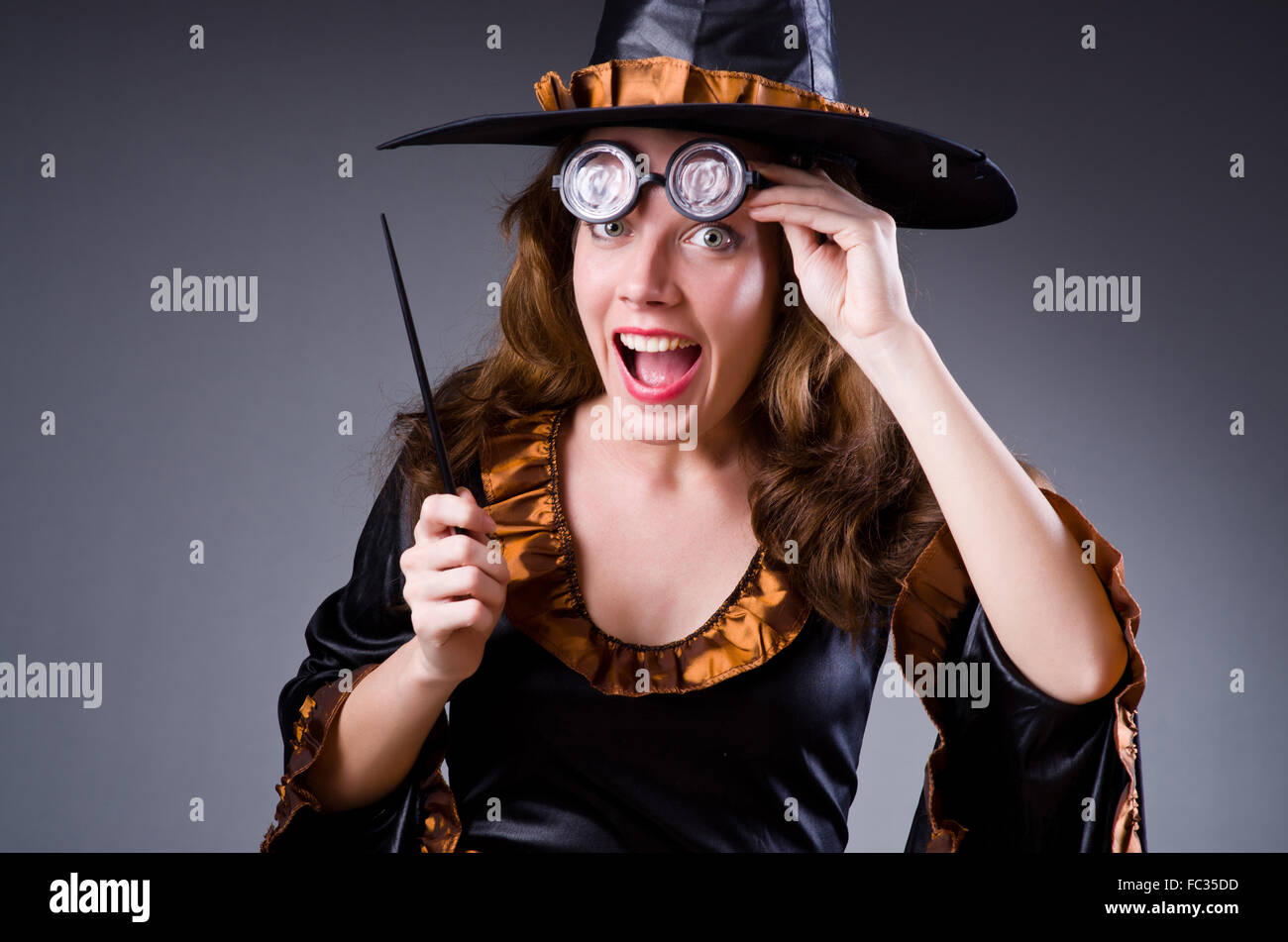 Witch doing her dirty tricks Stock Photo - Alamy