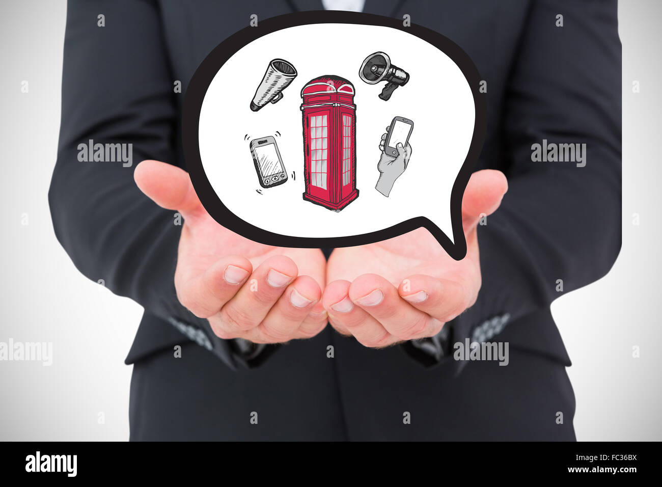 Composite image of businessman holding his hands out Stock Photo - Alamy