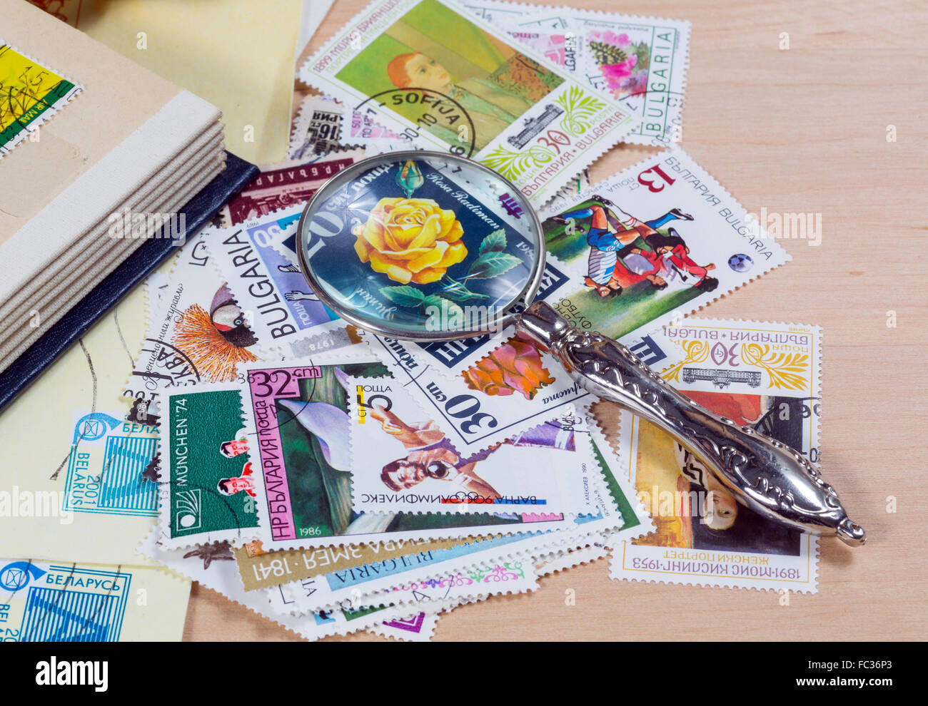 magnifier, postage stamps Stock Photo - Alamy