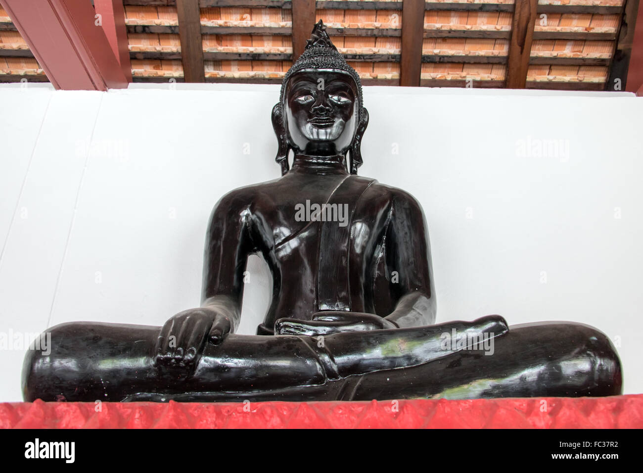 Black Buddha statue at Buddhist monastery Stock Photo - Alamy