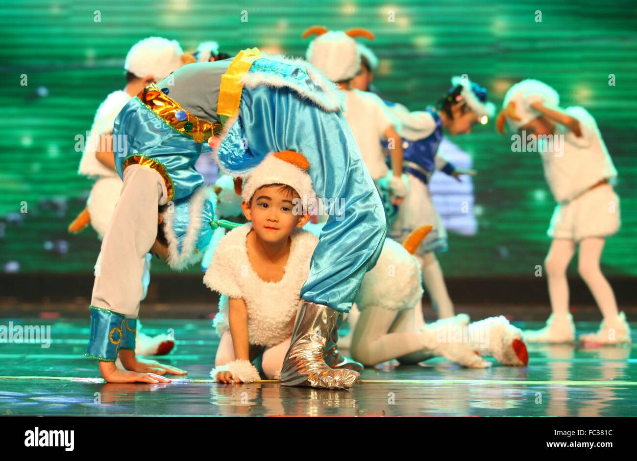 Tianjin, China. 19th Jan, 2016. Children perform during an activity to ...
