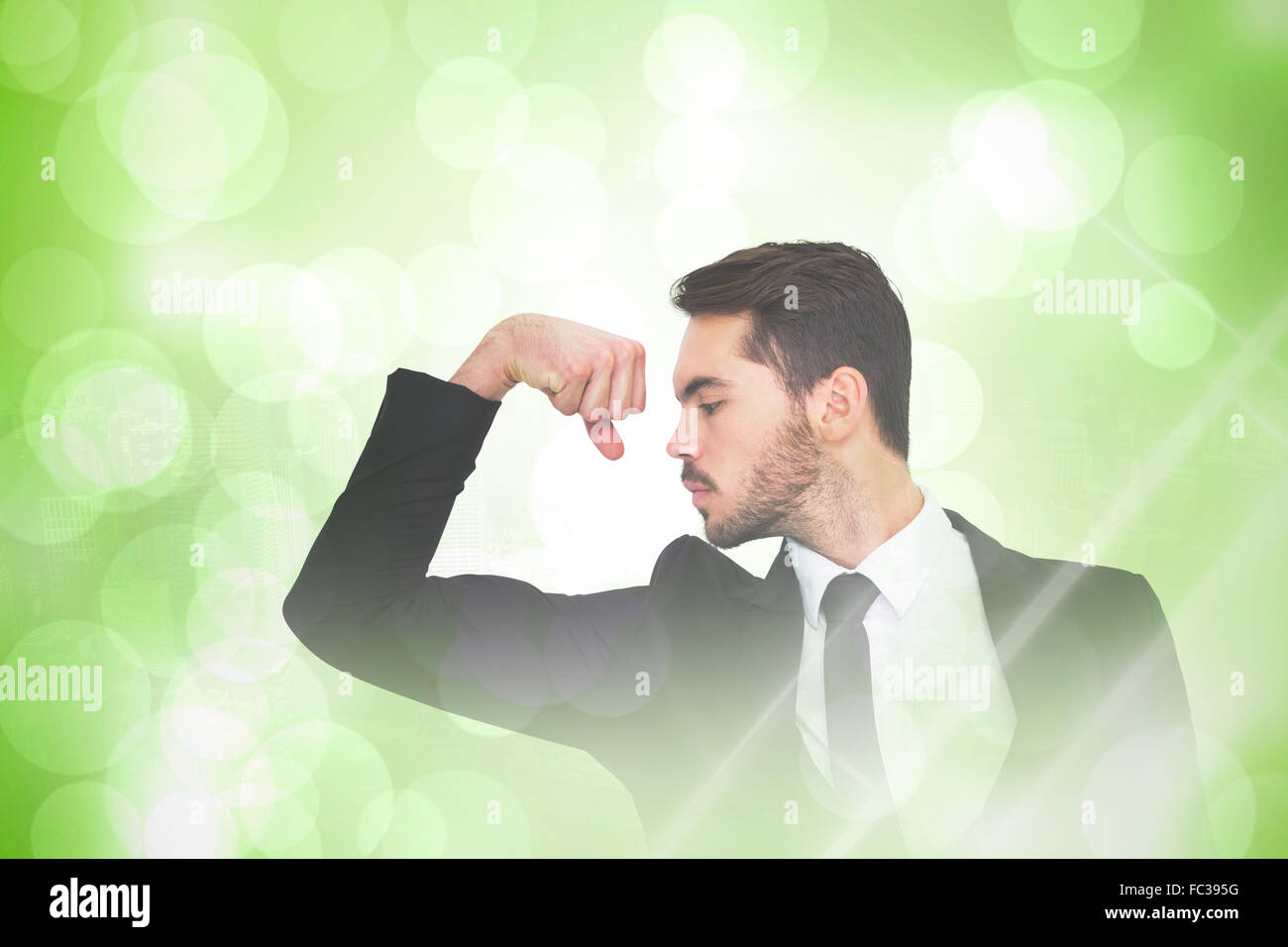 Man tensing bicep muscle hi-res stock photography and images - Alamy