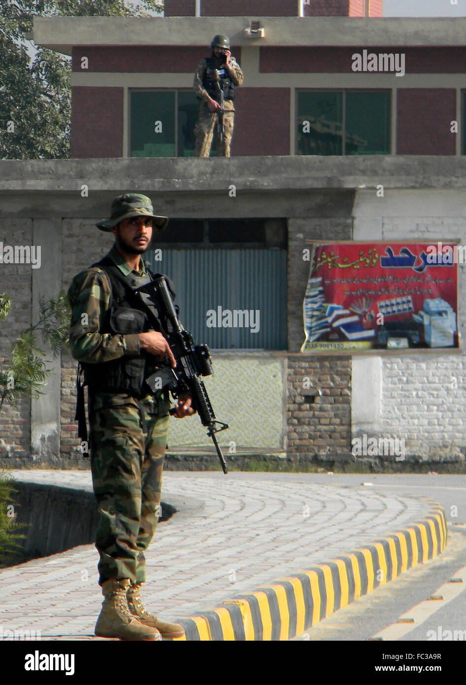 Charsadda. 20th Jan, 2016. Pakistani army soldiers stand guard at Bacha ...