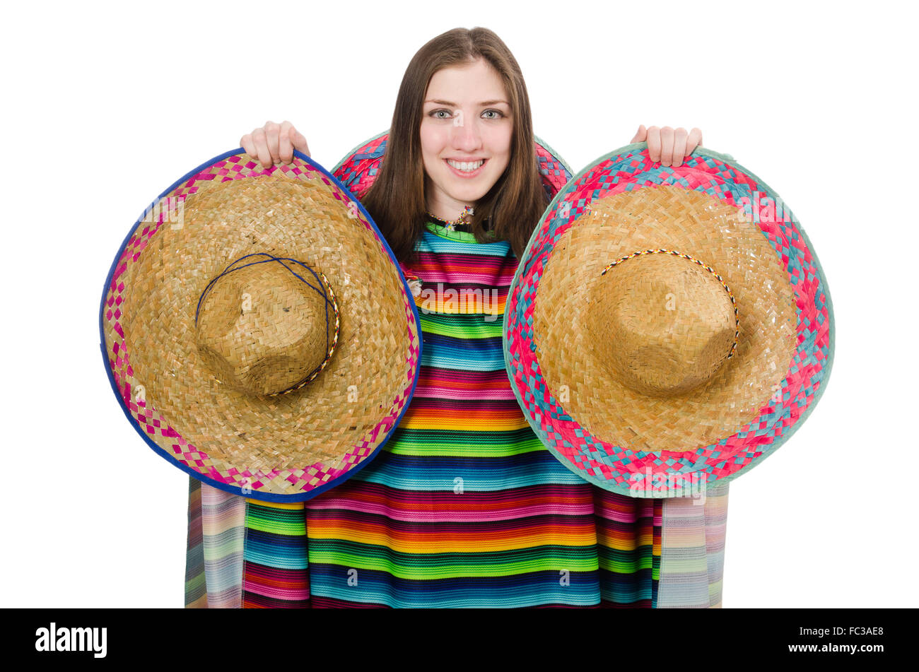 Pretty mexican girl in vivid poncho isolated on white Stock Photo - Alamy