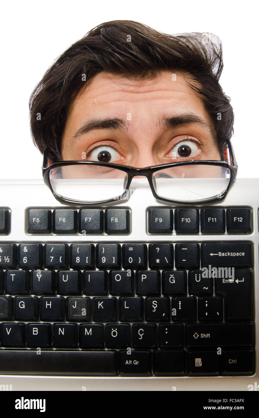 Young employee with keyboard isolated on white Stock Photo - Alamy