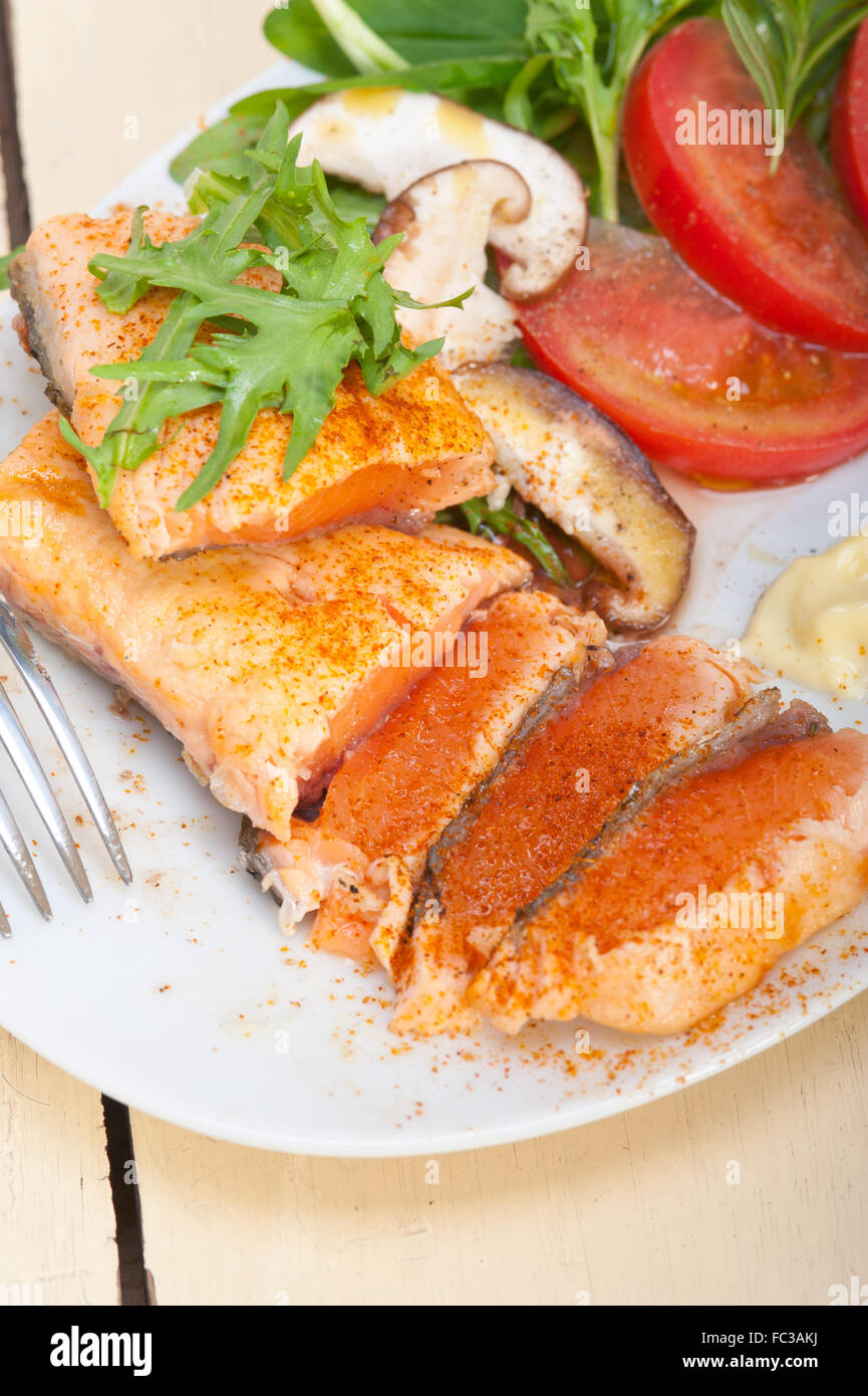 grilled samon filet with vegetables salad Stock Photo - Alamy