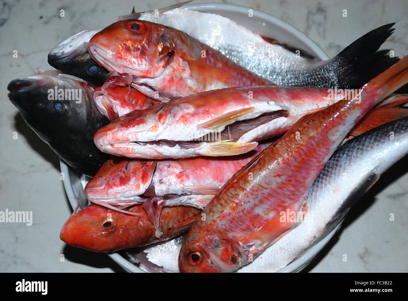 Fresh fish, red mullet and sea bass Stock Photo - Alamy