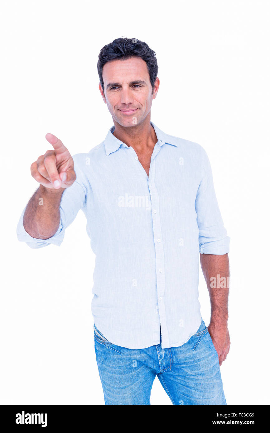 Handsome man pointing something with his finger Stock Photo - Alamy