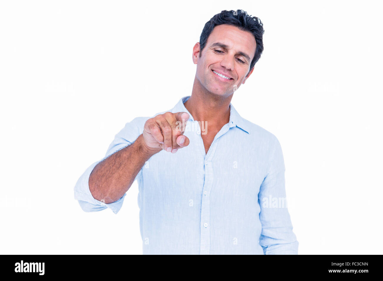 Handsome man pointing something with his finger Stock Photo - Alamy