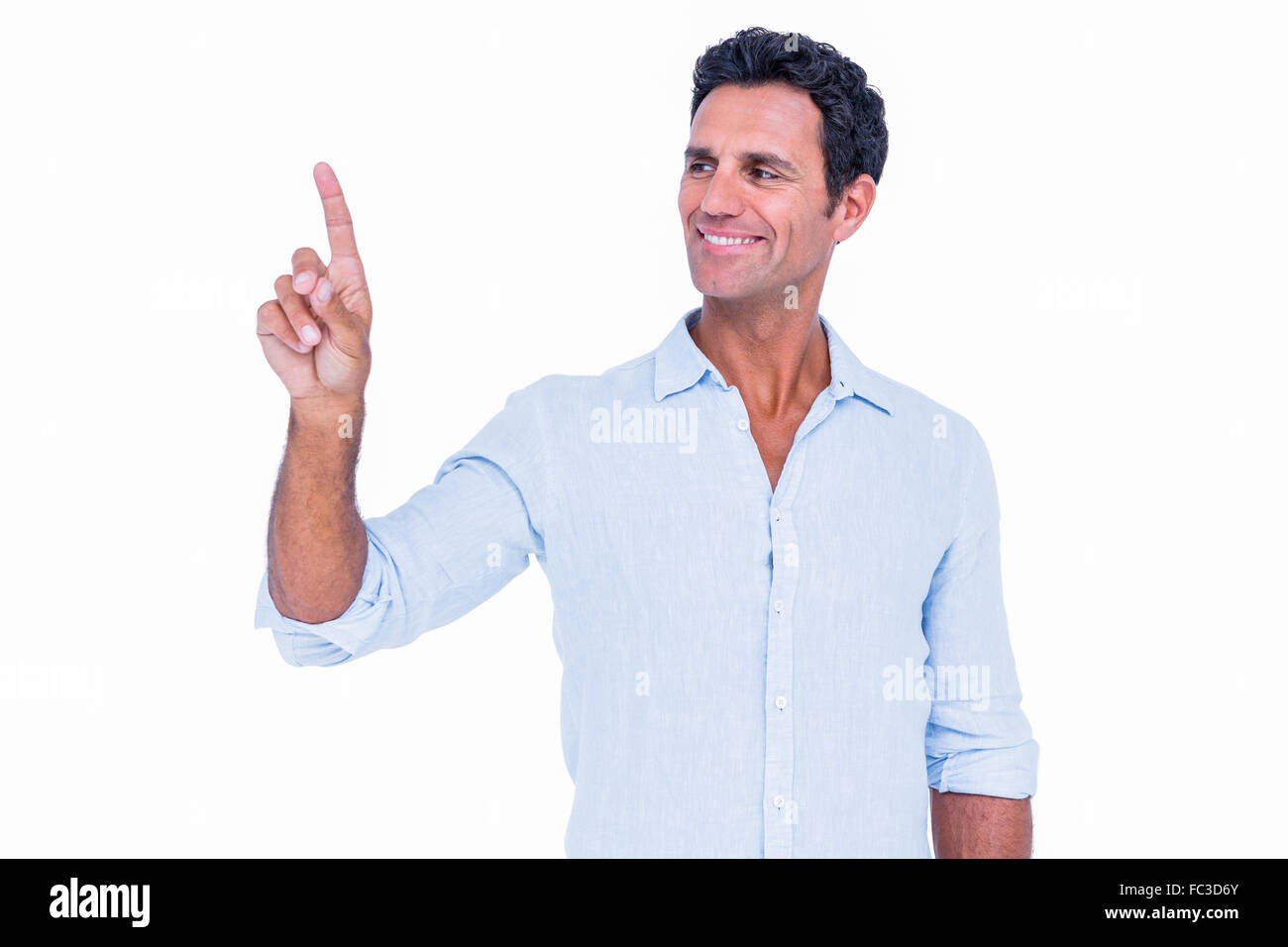 Handsome man pointing something with his finger Stock Photo - Alamy