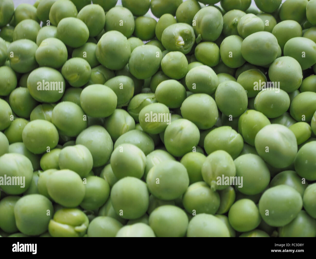 Green peas vegetable background Stock Photo - Alamy