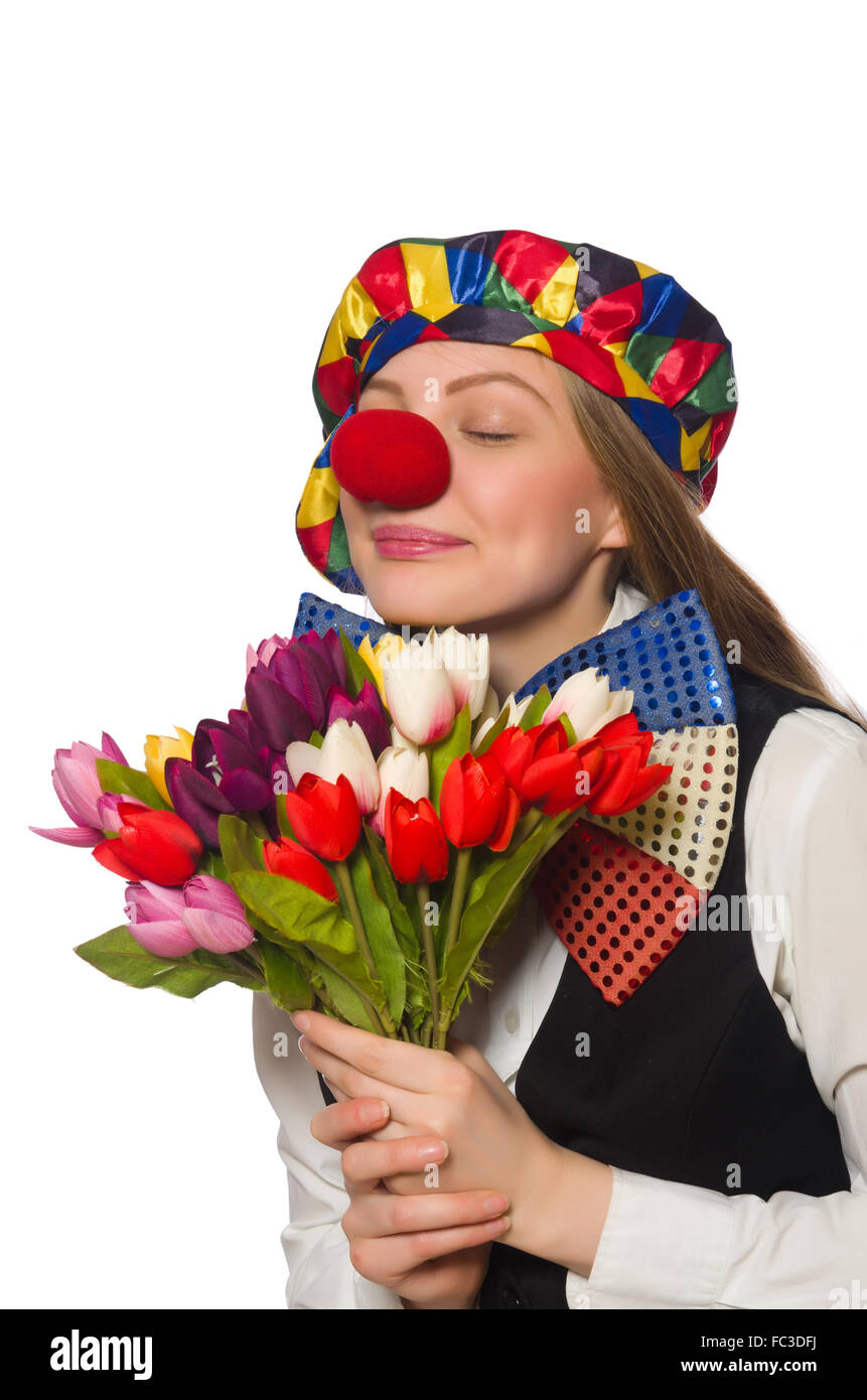 Pretty female clown with flowers isolated on white Stock Photo - Alamy