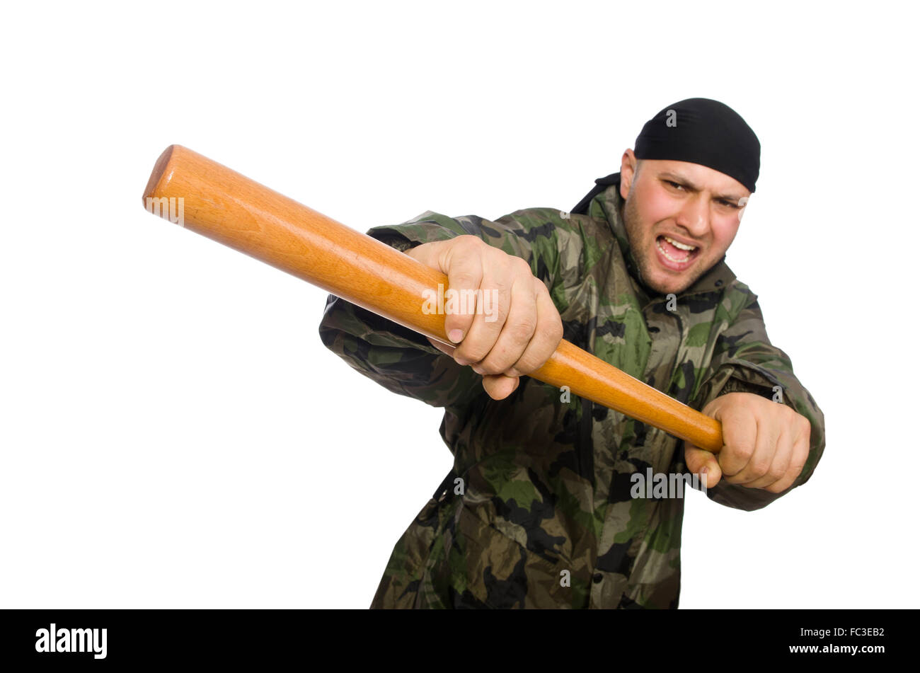 Young man in soldier uniform holding bludgeon isolated on white Stock ...