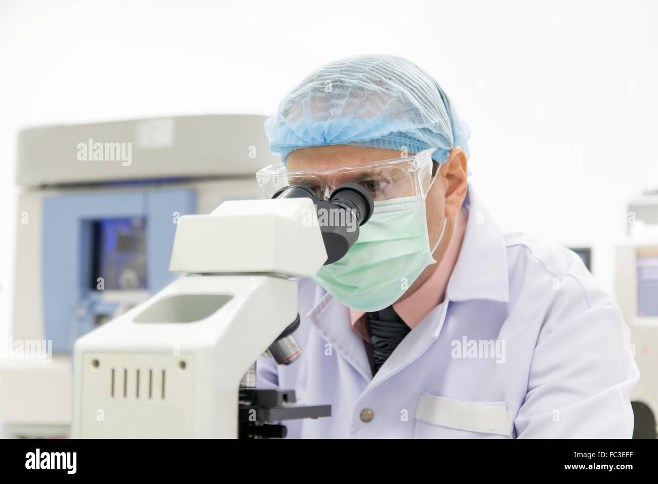 Lab tech microscope mask hi-res stock photography and images - Alamy