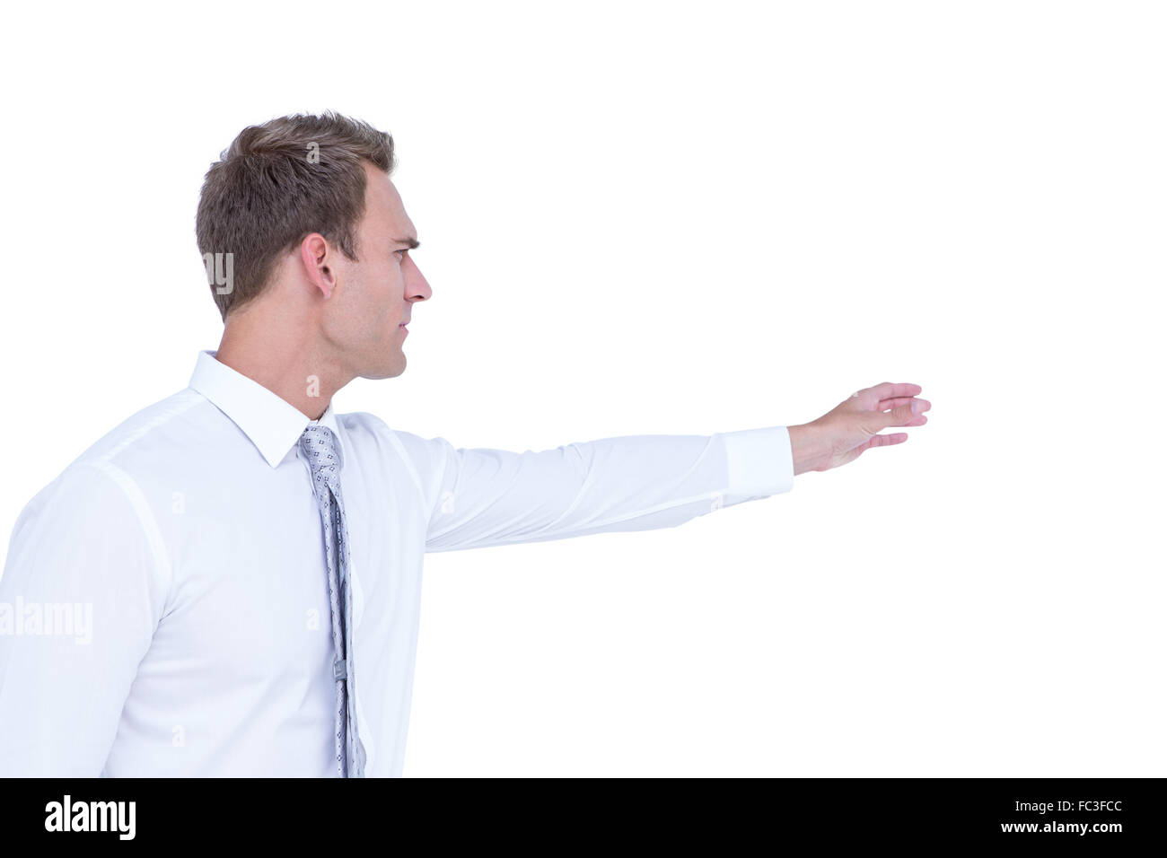 Side view of businessman showing something with his hand Stock Photo ...
