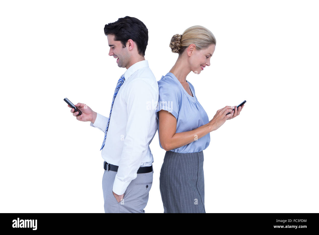 Business people using smartphone back to back Stock Photo - Alamy