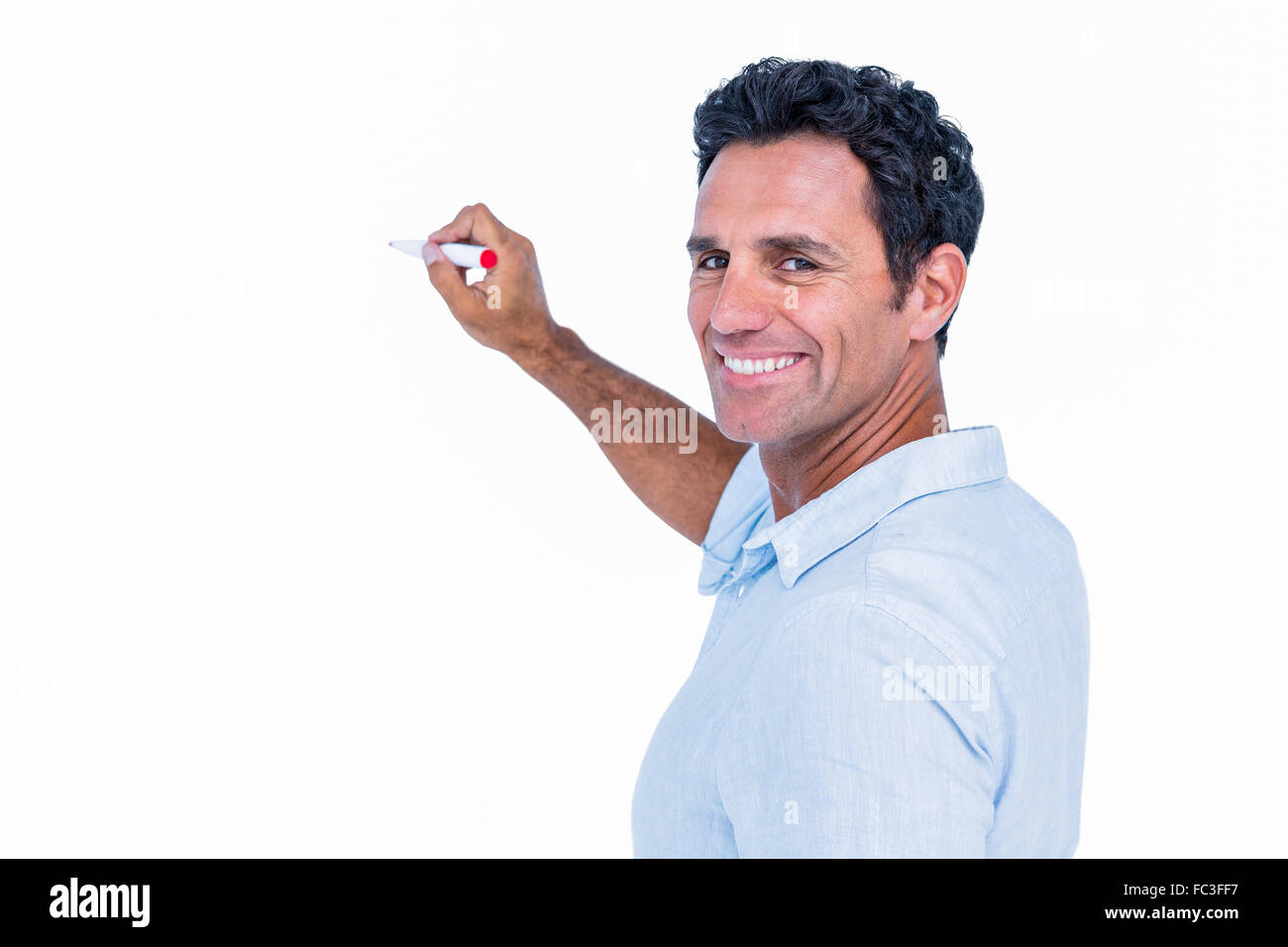 Handsome man writing something with red markers Stock Photo - Alamy