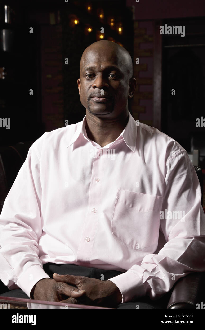 Male table darkness hi-res stock photography and images - Alamy