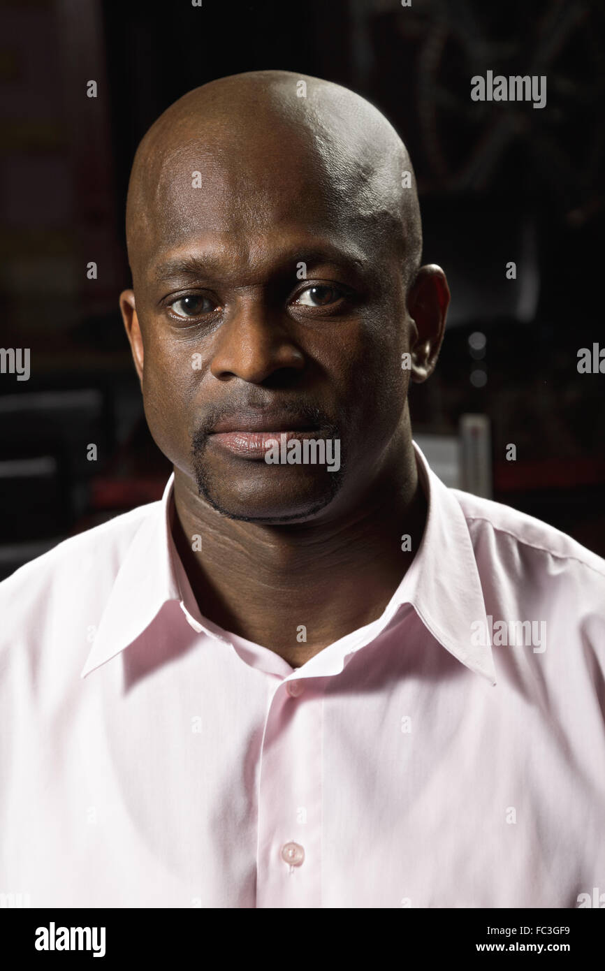 Guy in pink shirt Stock Photo - Alamy