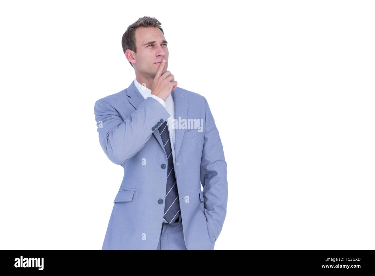 Handsome businessman thinking with finger on chin Stock Photo - Alamy
