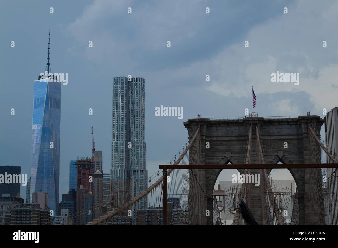 Crossing the bBrooklyn bridge before a storm Stock Photo - Alamy