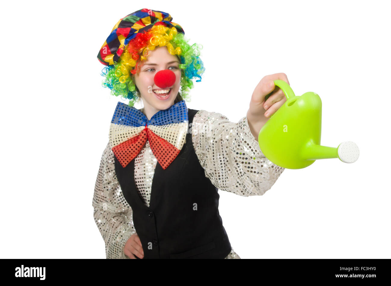 Female clown with watering can isolated on white Stock Photo - Alamy