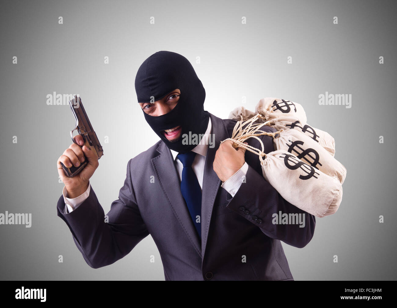 Gangster with bags of money on white Stock Photo - Alamy