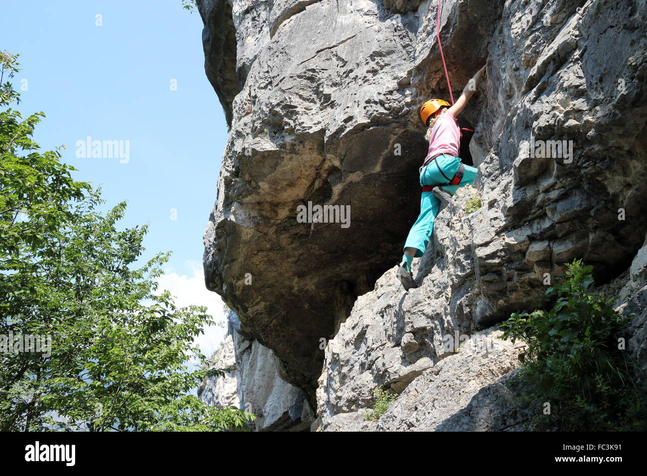 girl is climbing up Stock Photo - Alamy
