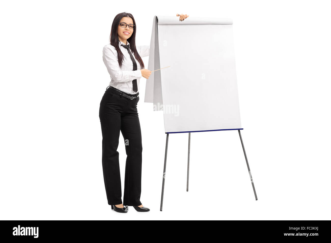 Full length portrait of a young businesswoman pointing on a ...