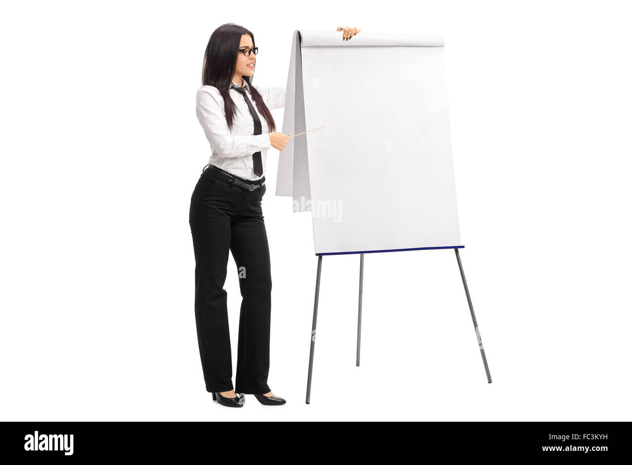 Young female employee pointing on a presentation board with a stick ...