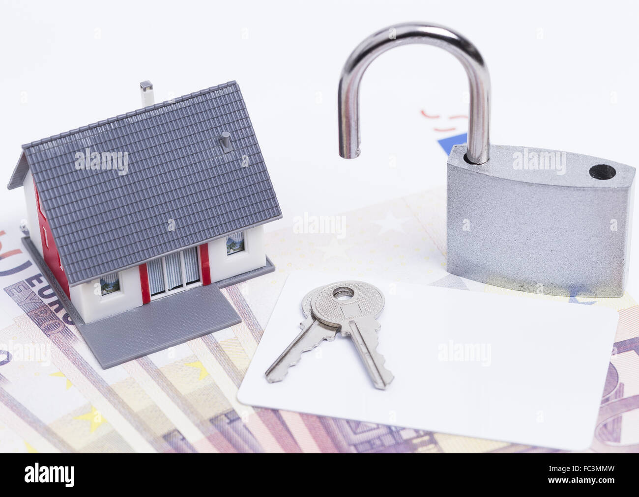 House money padlock card Stock Photo - Alamy
