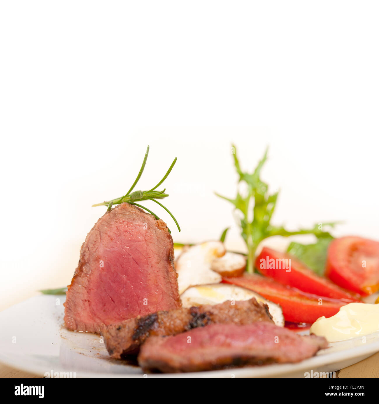 beef filet mignon grilled with vegetables Stock Photo - Alamy