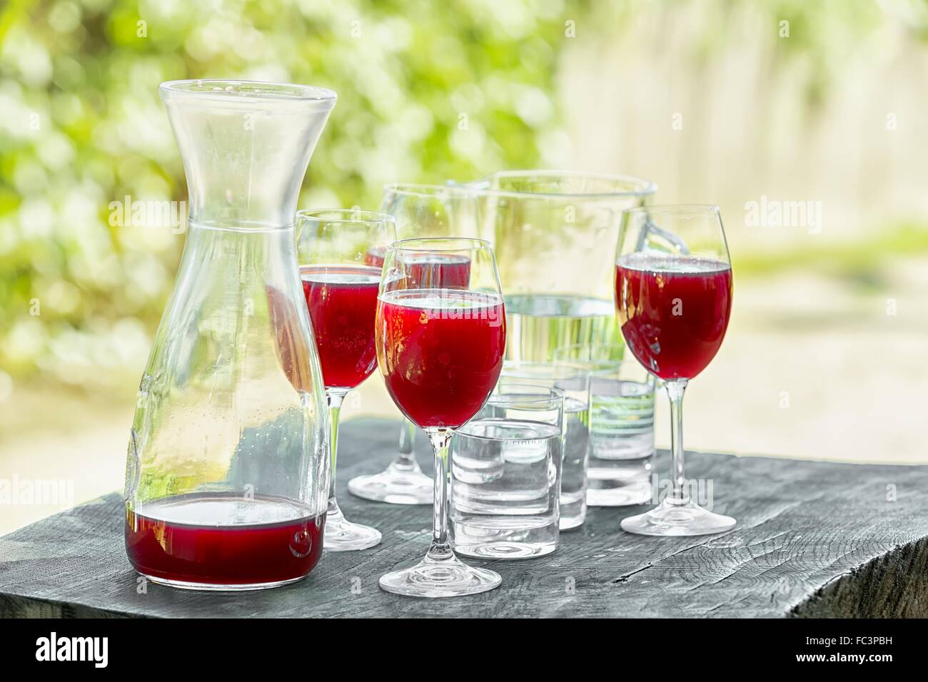 Red stum in glass on the barrel Stock Photo - Alamy