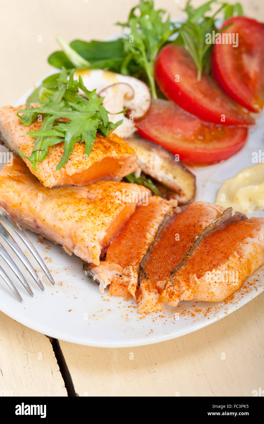 grilled samon filet with vegetables salad Stock Photo - Alamy
