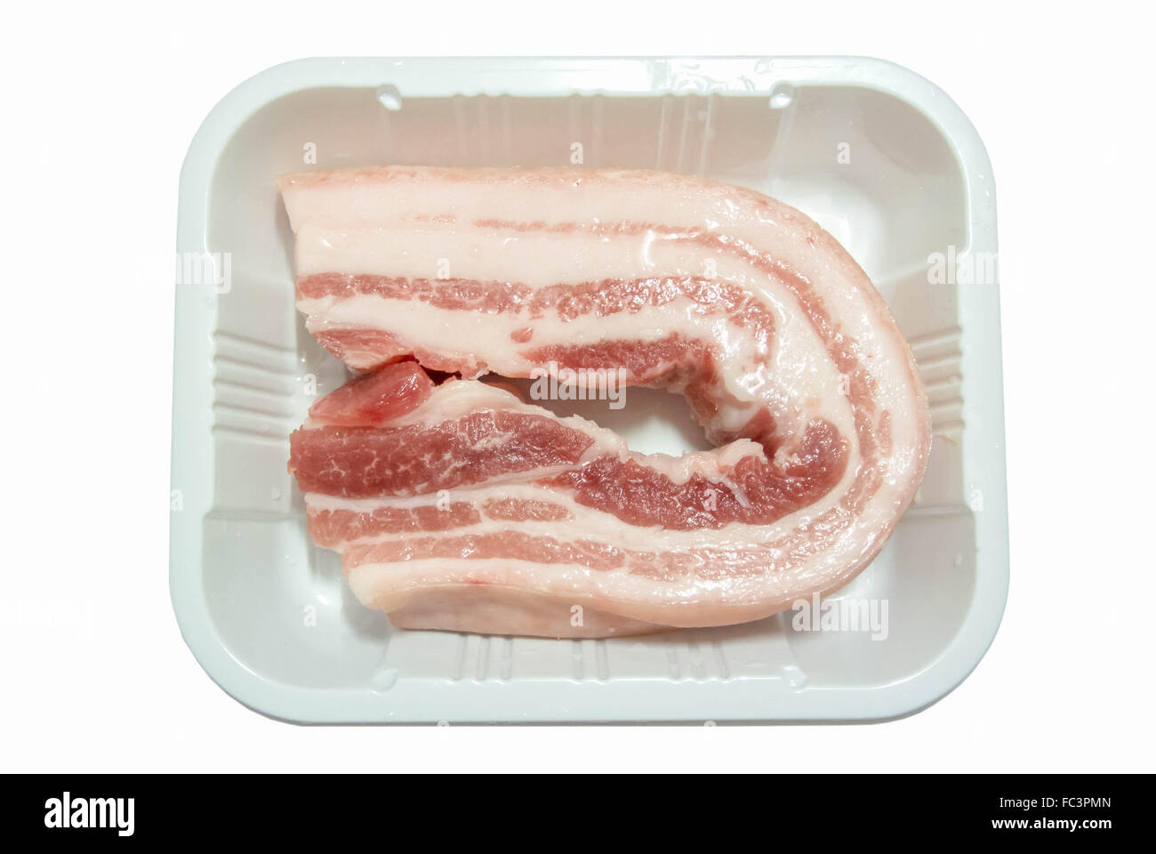 streaky pork in plastic tray package Stock Photo - Alamy