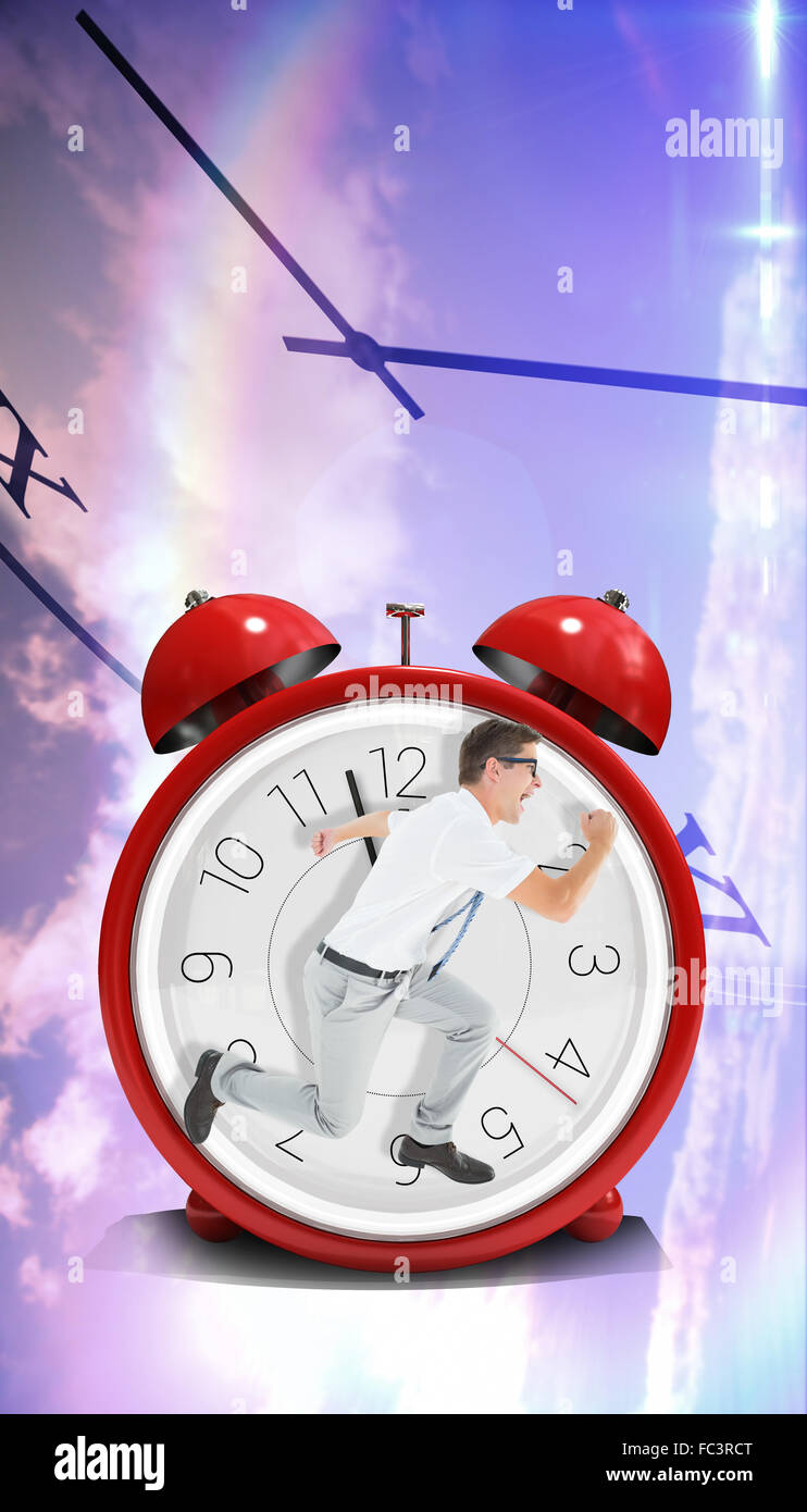 Composite image of geeky happy businessman running mid air Stock Photo ...