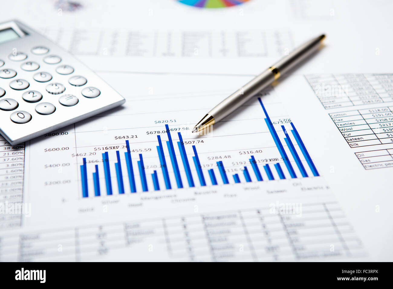 financial charts and graphs on the table Stock Photo - Alamy