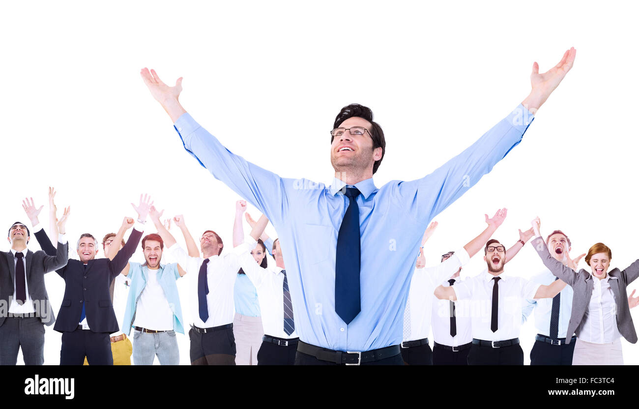 Composite image of cheering businessman with his arms raised up Stock ...