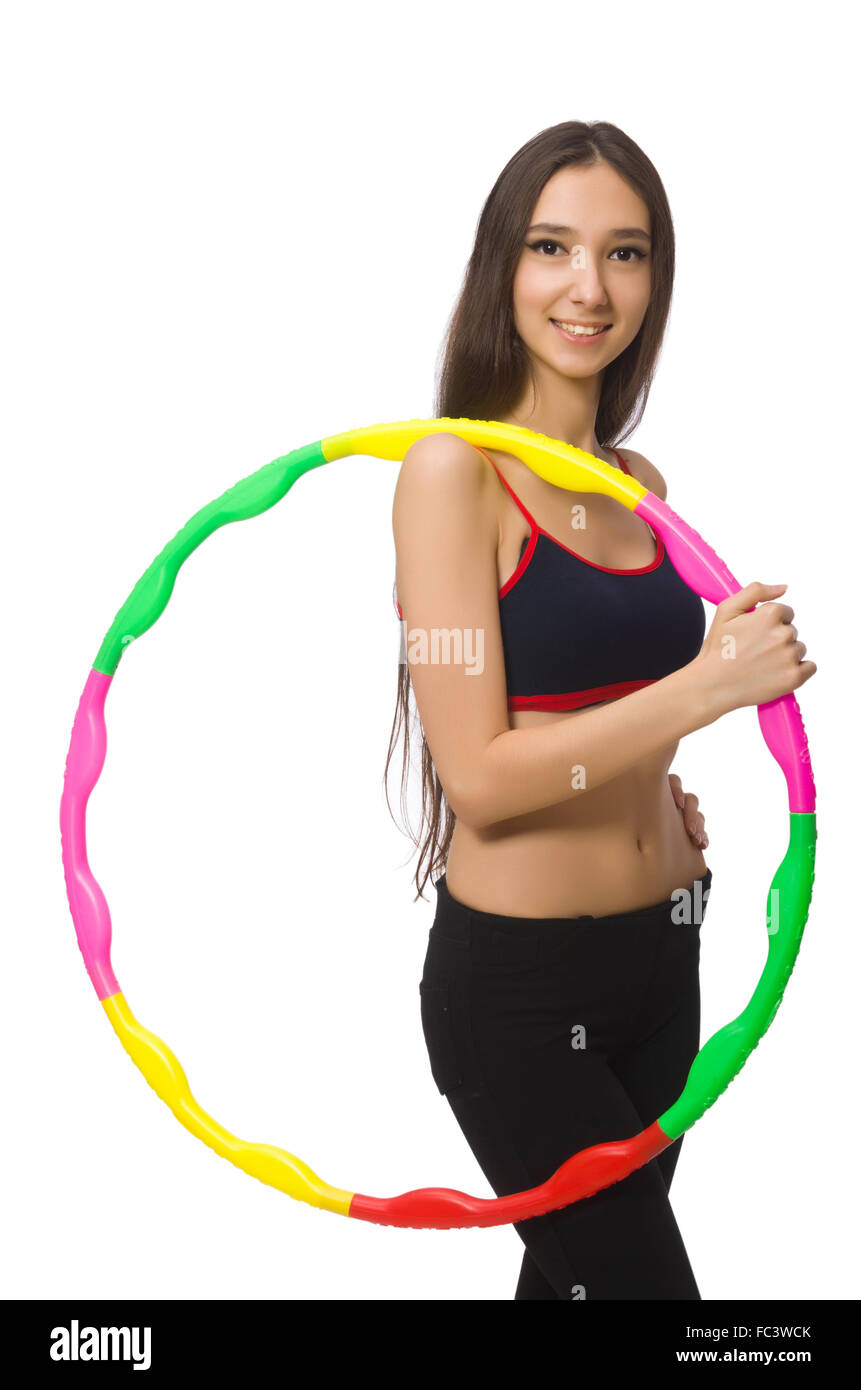 A girl in sport suit with hula hoop isolated on white Stock Photo - Alamy