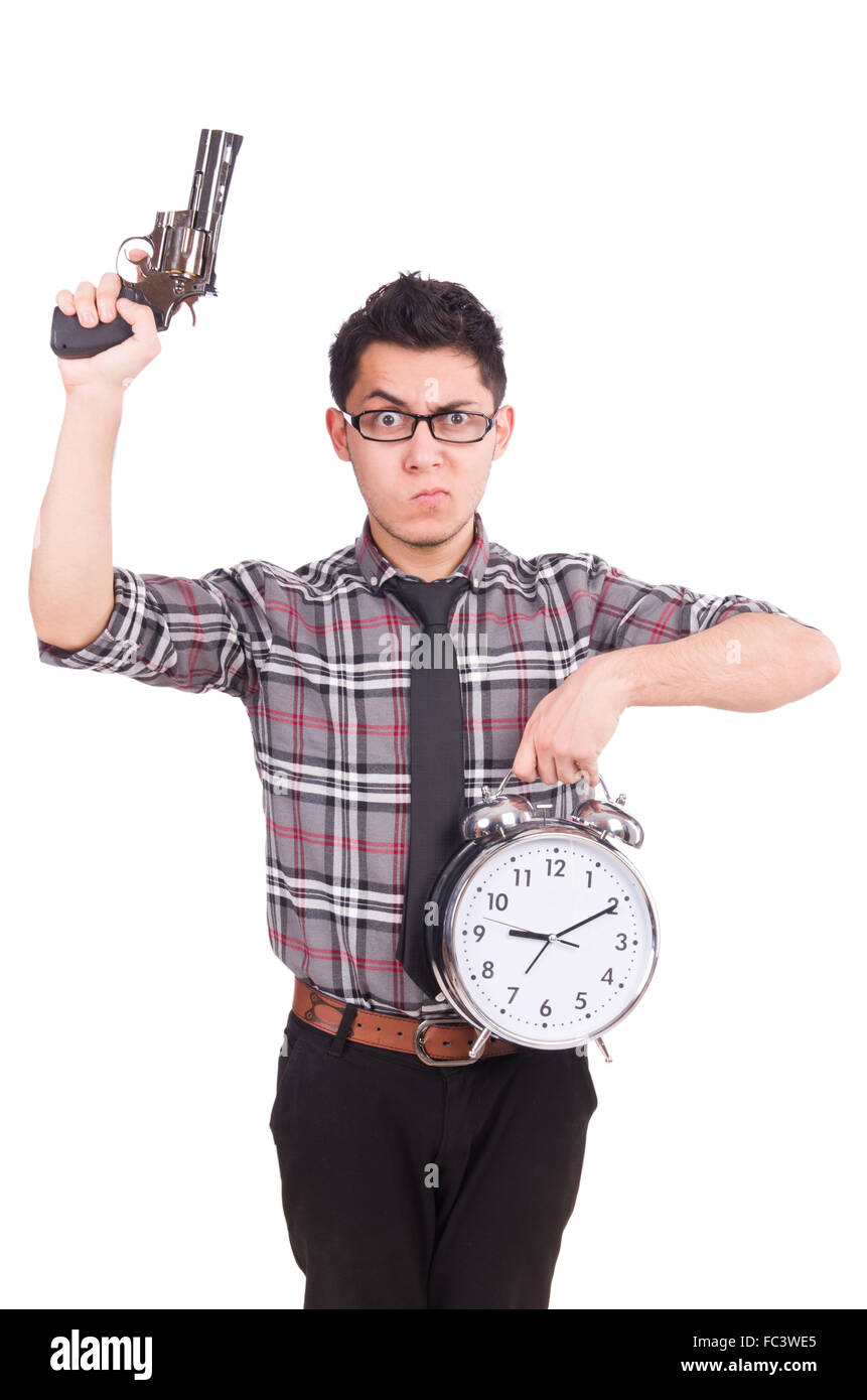 Employee holding alarm clock and weapon isolated on white Stock Photo ...